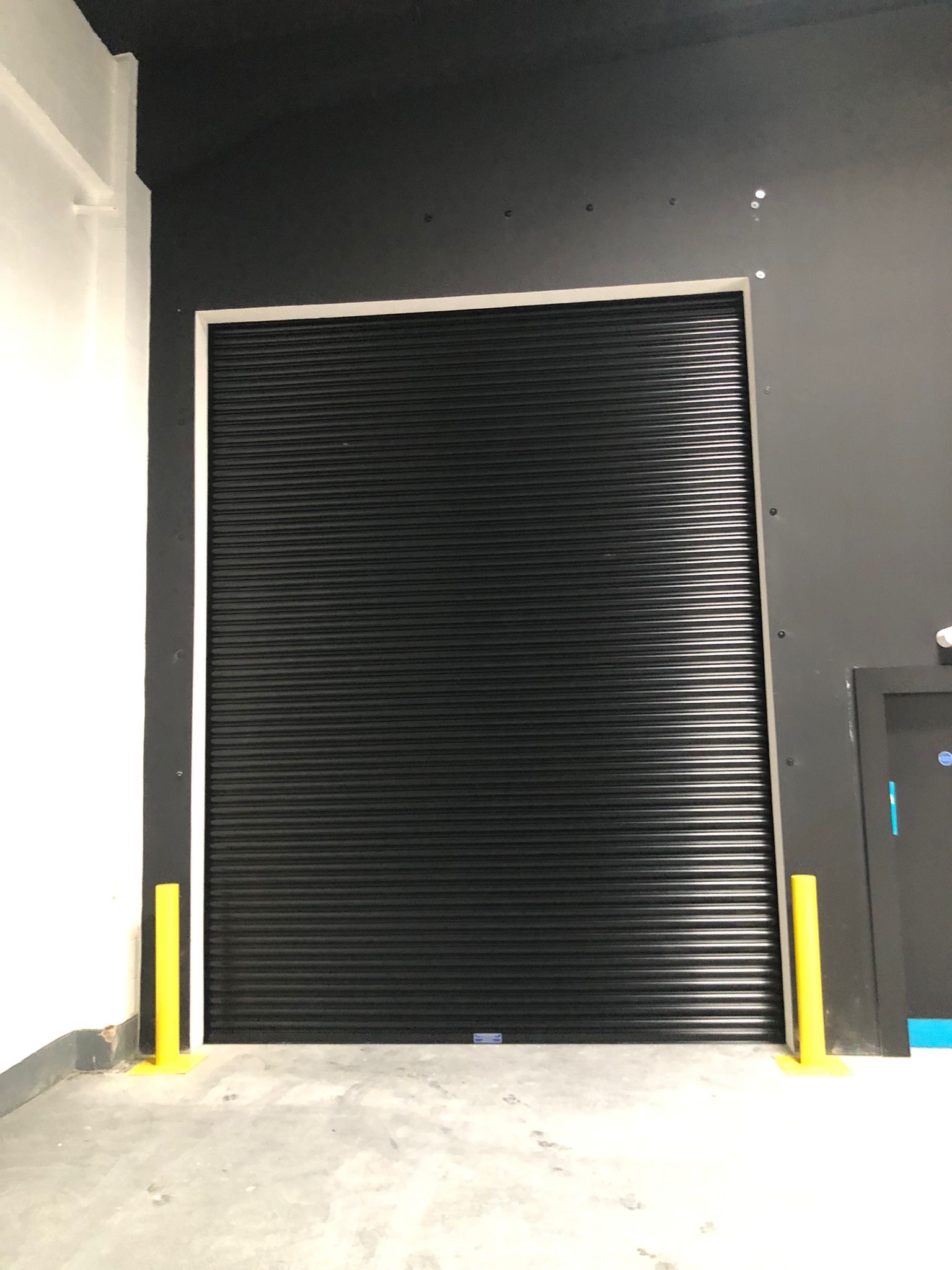 How we install safety posts for shutters - Roller Shutter Services